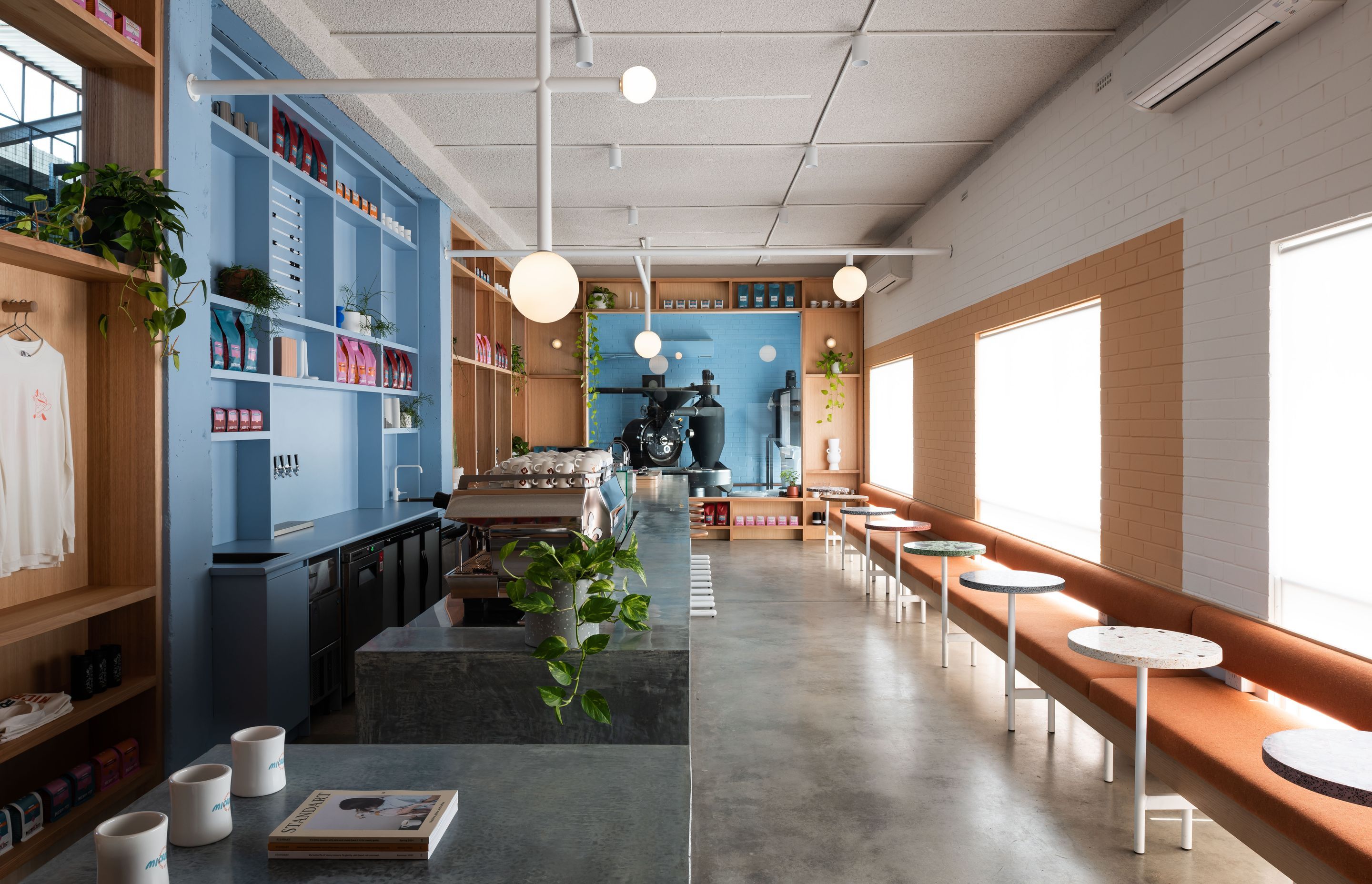 This vibrant coffee shop offers a breezy respite from its industrial ...