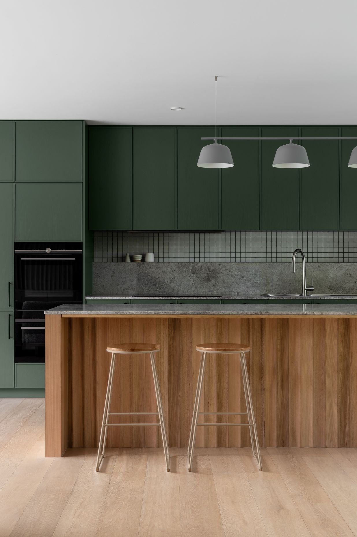 Clad in spotted gum, this rustic addition offers a serene and low ...