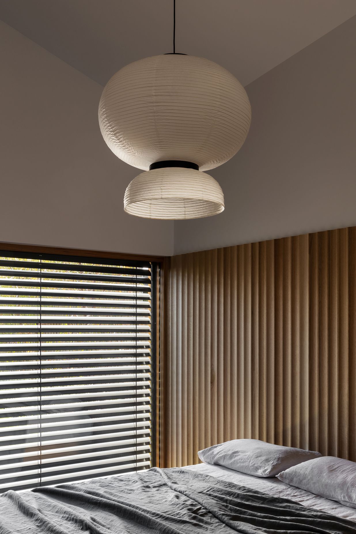 Clad in spotted gum, this rustic addition offers a serene and low ...
