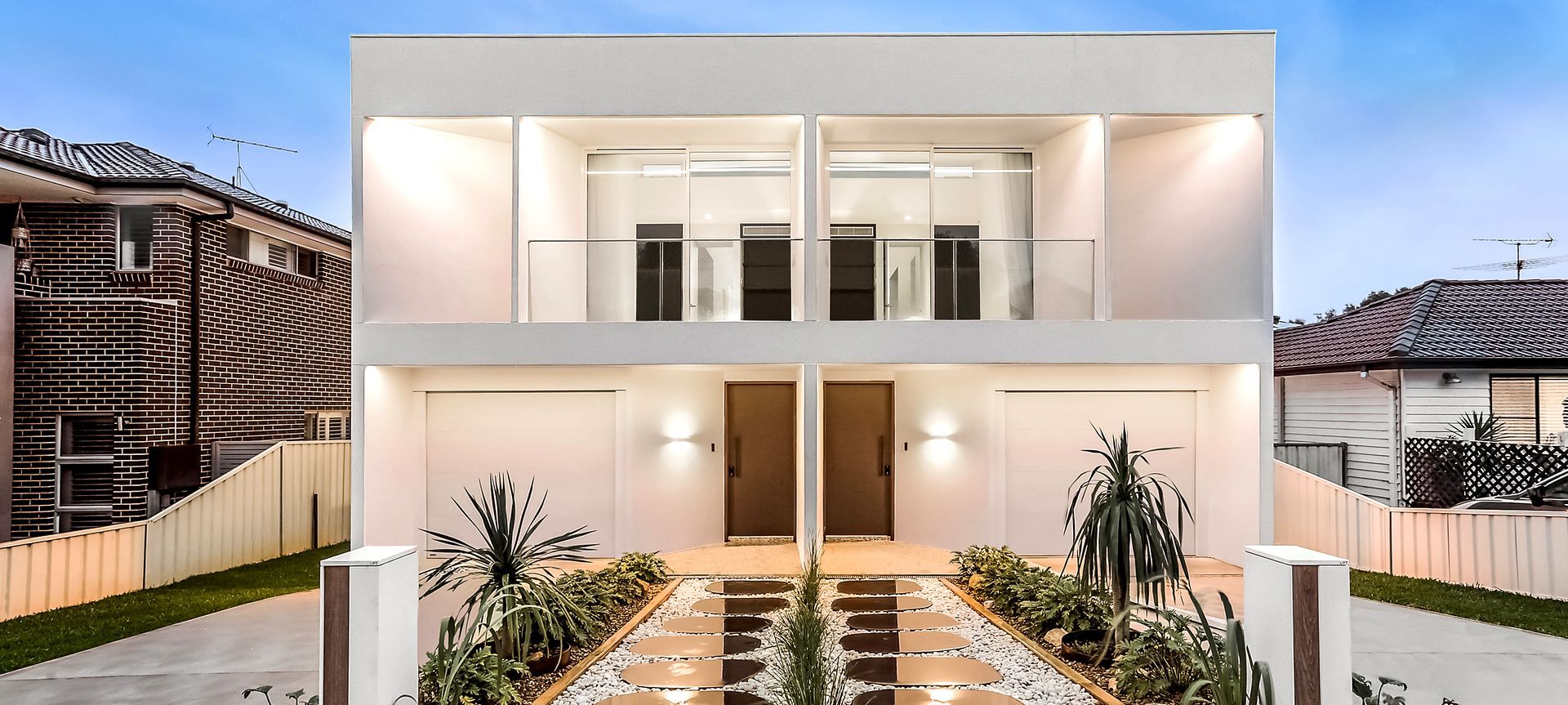 White Duplex by Veriview Property Group | ArchiPro AU