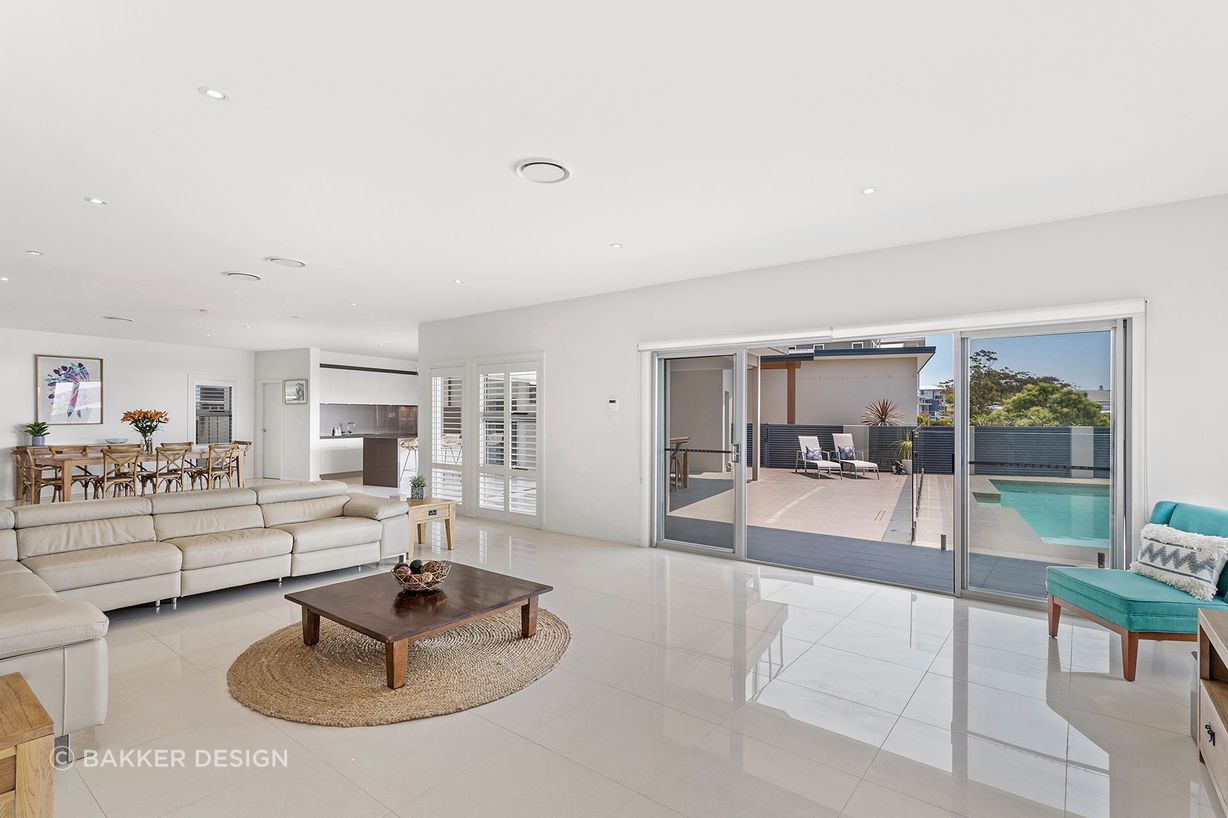 Two storey home overlook pool by Bakker Design | ArchiPro AU