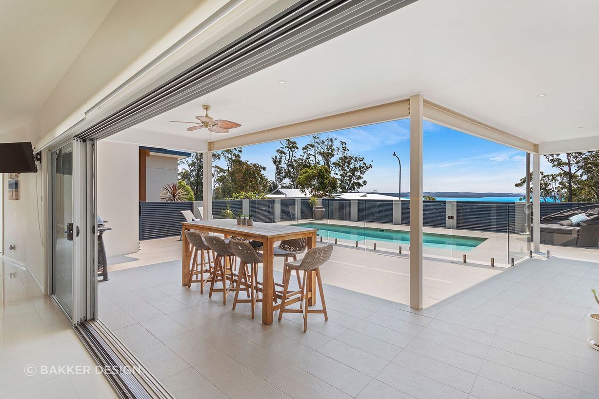 Two storey home overlook pool by Bakker Design | ArchiPro AU