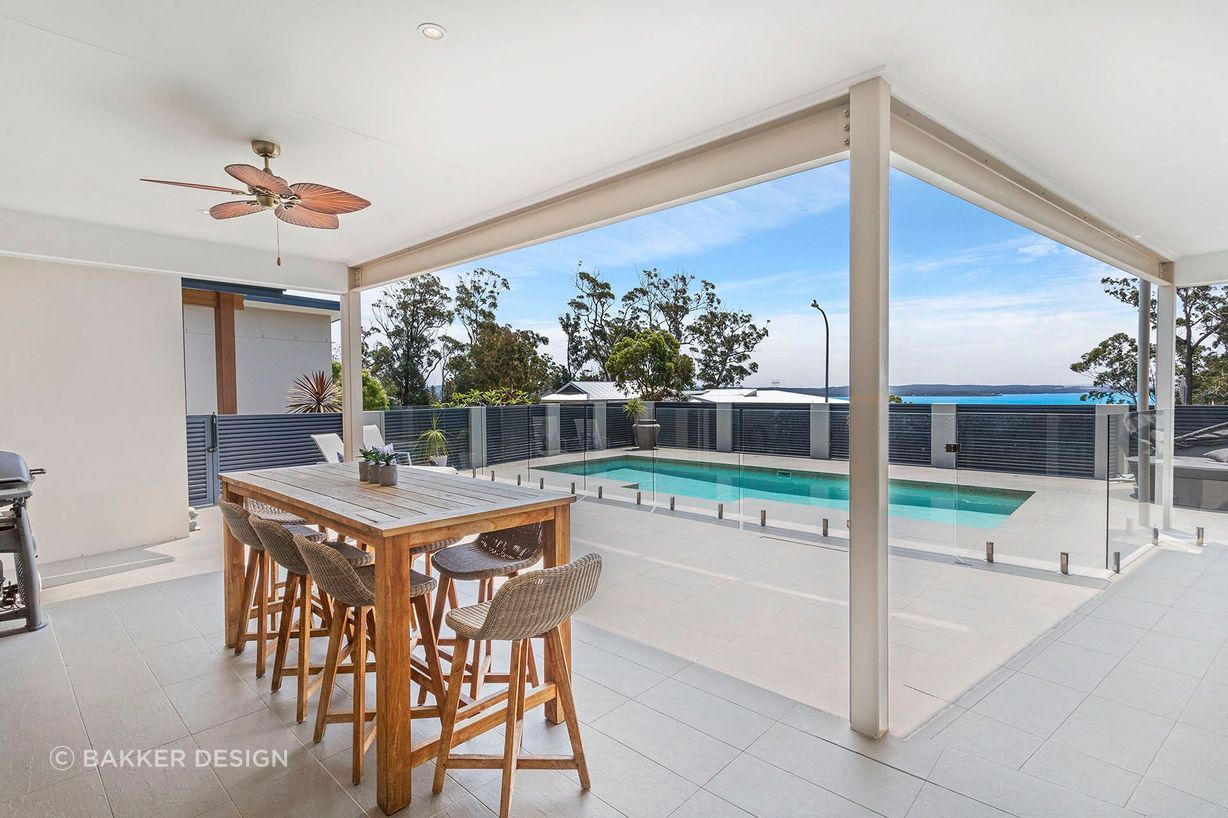 Two storey home overlook pool by Bakker Design | ArchiPro AU