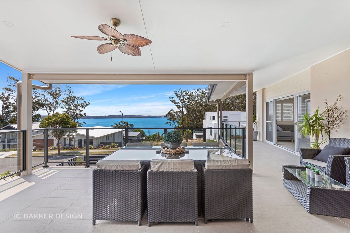 Two storey home overlook pool by Bakker Design | ArchiPro AU