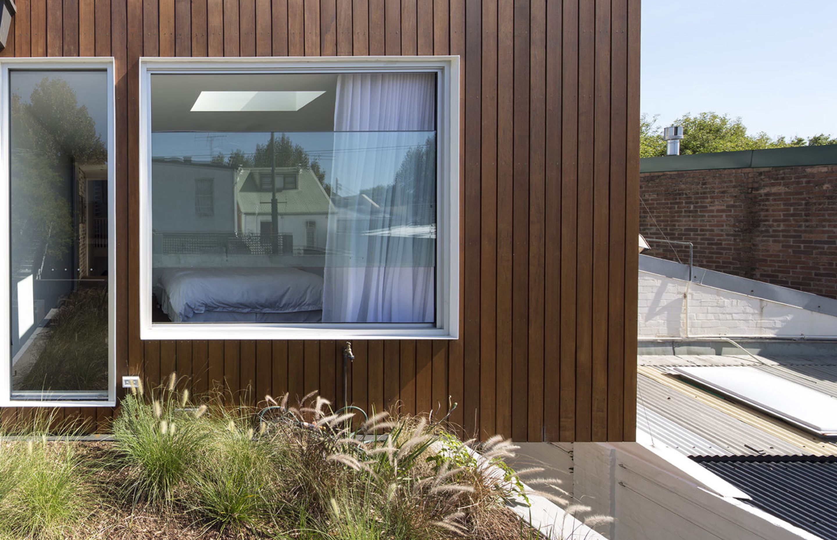 Long Courtyard House by Scale Architecture | ArchiPro AU