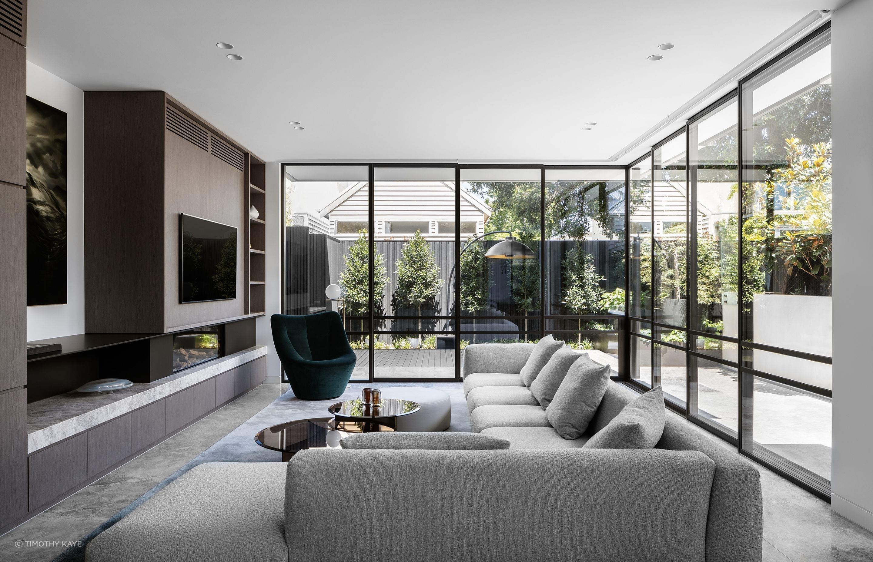 House of Bronzed Steel and Stone by Anderson Construction | ArchiPro AU