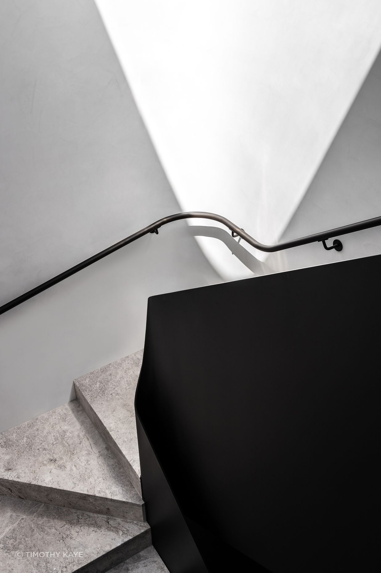 House of Bronzed Steel and Stone by Anderson Construction | ArchiPro AU