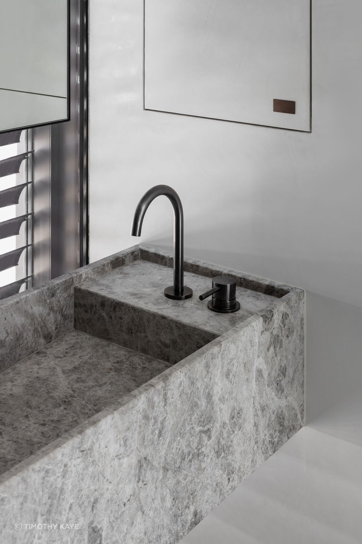 House of Bronzed Steel and Stone by Anderson Construction | ArchiPro AU