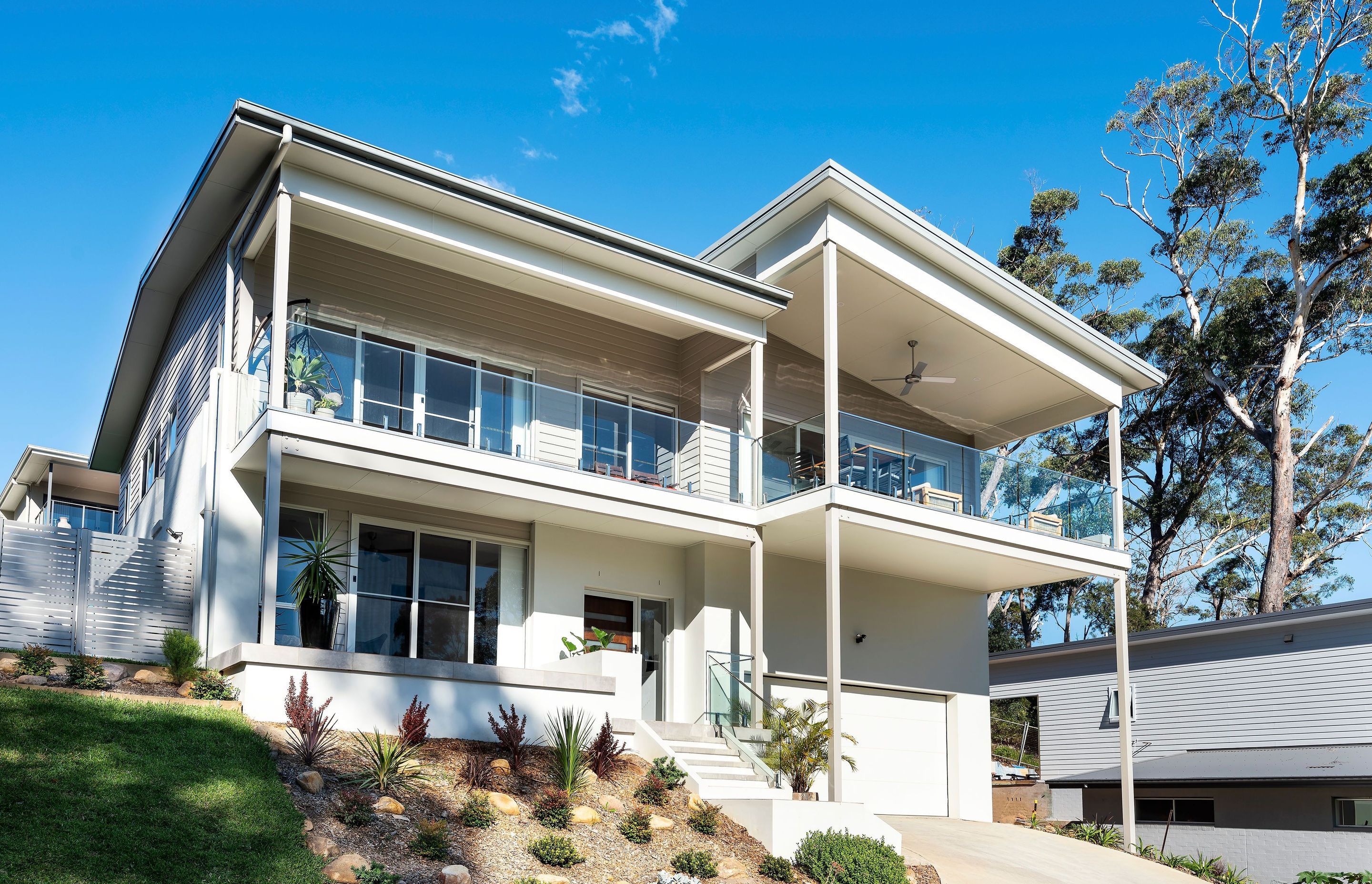 Two Storey Home on steep block by Bakker Design | ArchiPro AU