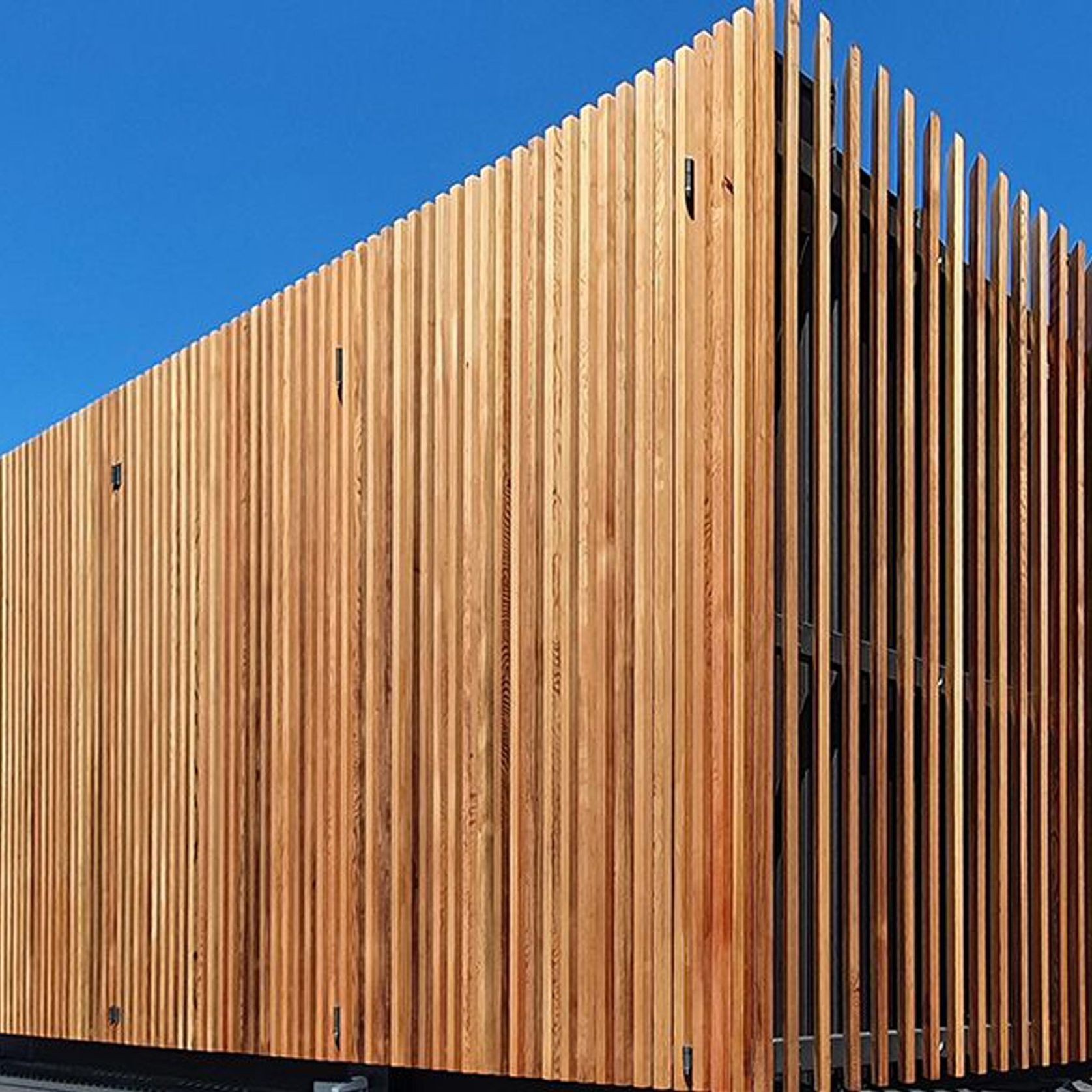 Motorised Vertical Bi-Fold Screens | ADI | ArchiPro AU