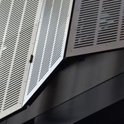 Motorised Vertical Bi-Fold Screens | ADI | ArchiPro AU