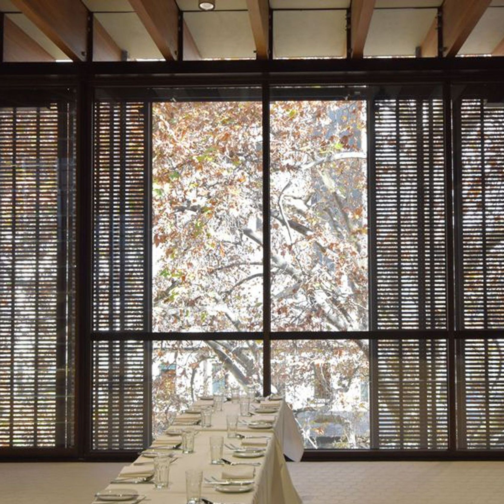 Motorised Vertical Bi-Fold Screens | ADI | ArchiPro AU