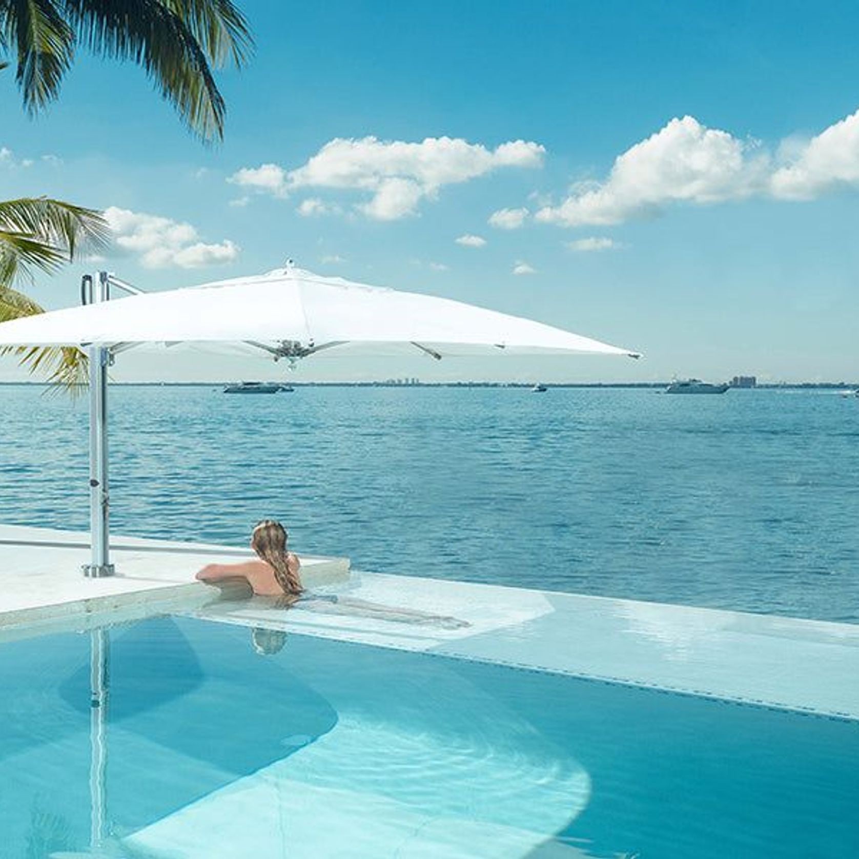 "Poolside, Swim-Under" Umbrella by Tuuci | ArchiPro AU