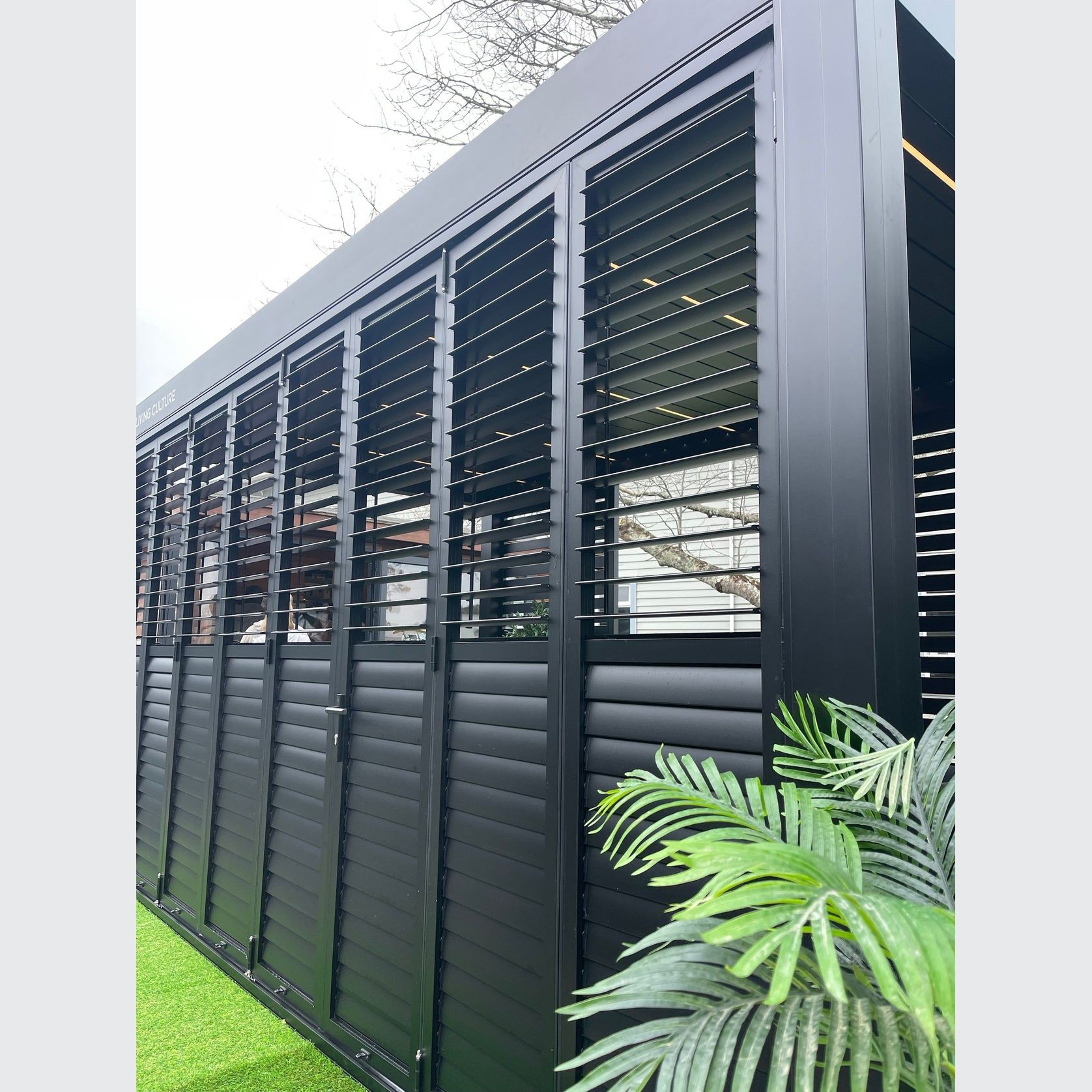 Tasman Wall Mounted Pergola Bifold Shutter Wall | ArchiPro AU