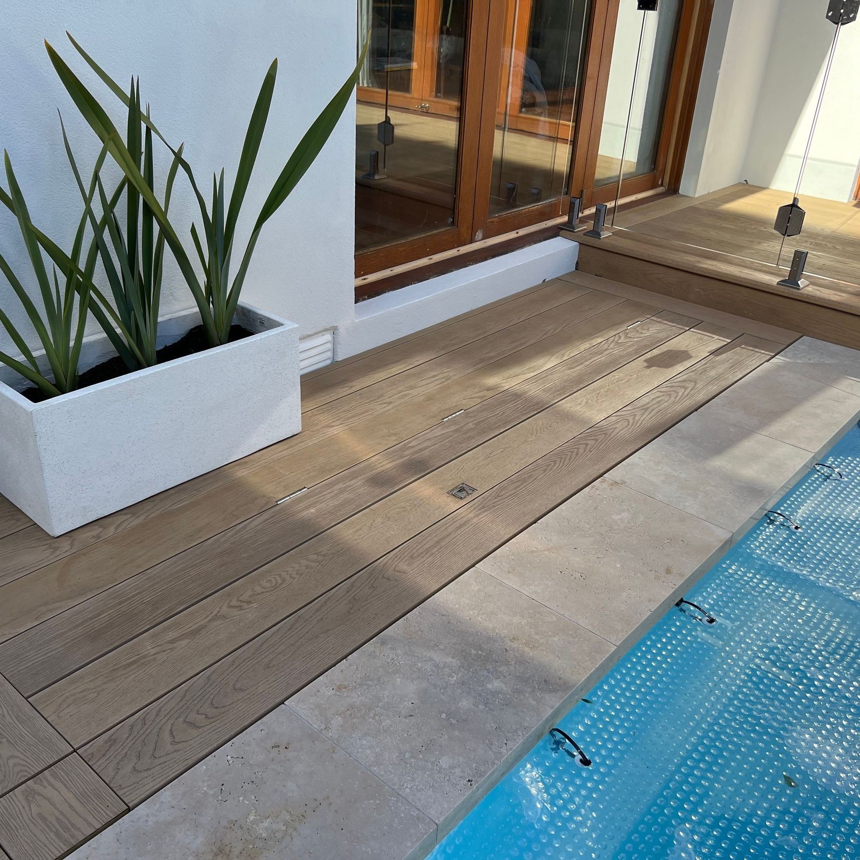 Under Deck UnderCover® Concealed Pool Cover - Powered | ArchiPro AU