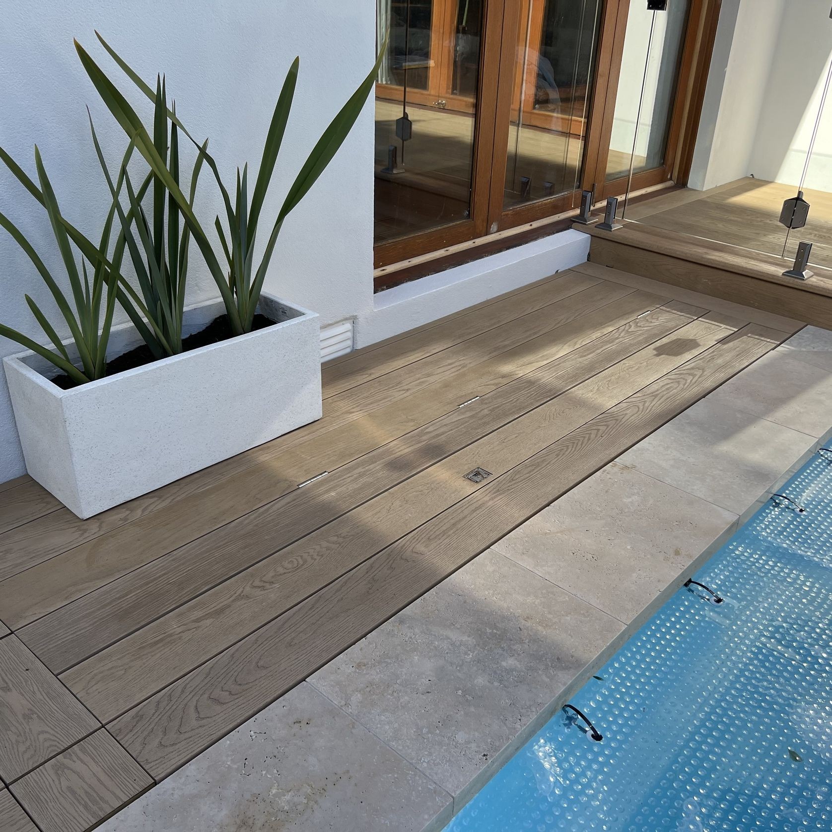 Under Deck UnderCover® Concealed Pool Cover - Powered | ArchiPro AU