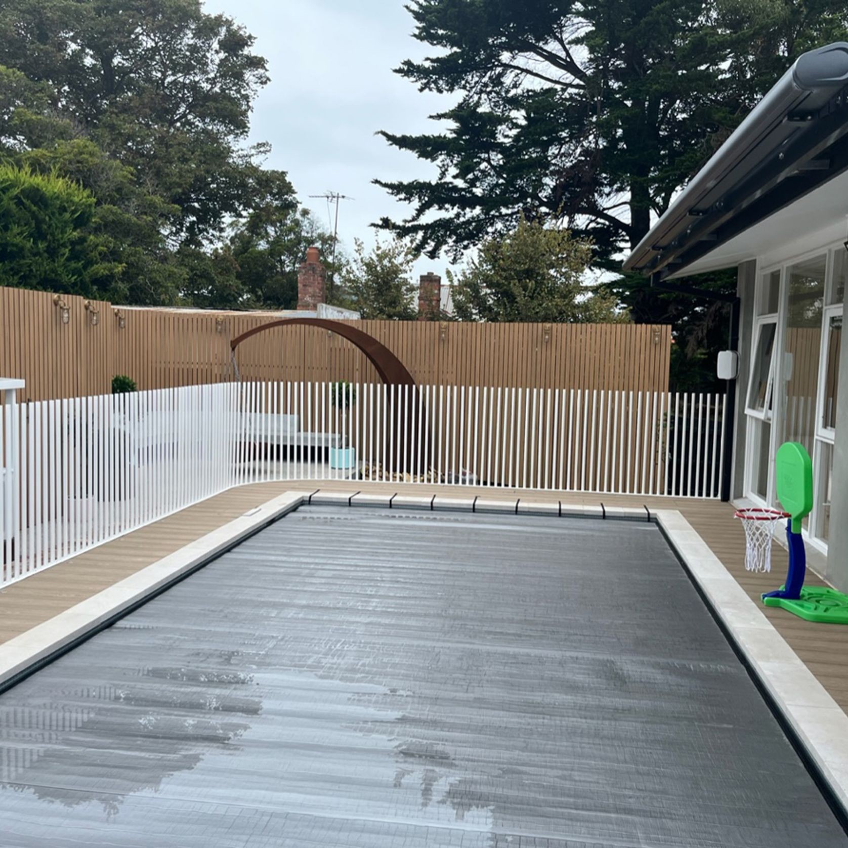 Under Deck UnderCover® Concealed Pool Cover - Powered | ArchiPro AU