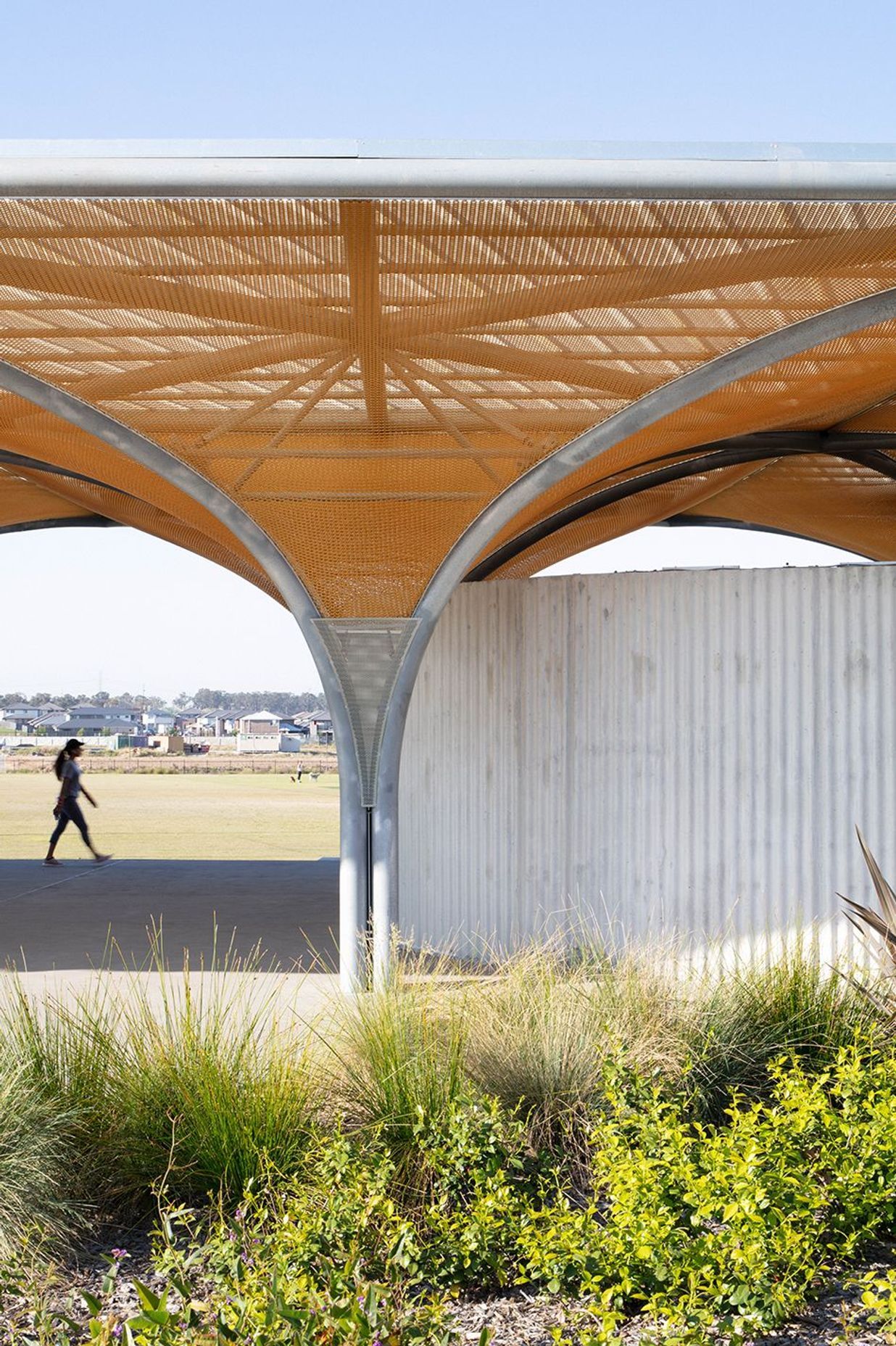 Golden Mesh Shades a Sports Pavilion in Sydney | ArchiPro AU