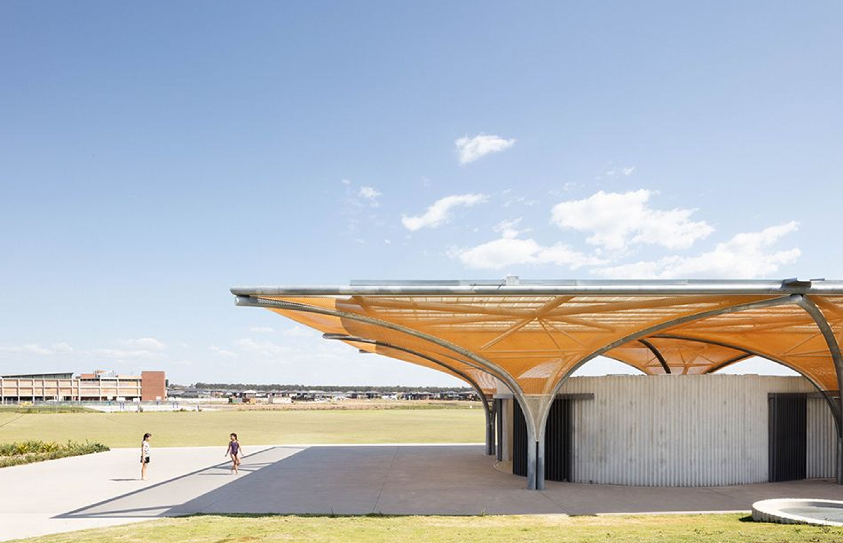 Golden Mesh Shades a Sports Pavilion in Sydney | ArchiPro AU