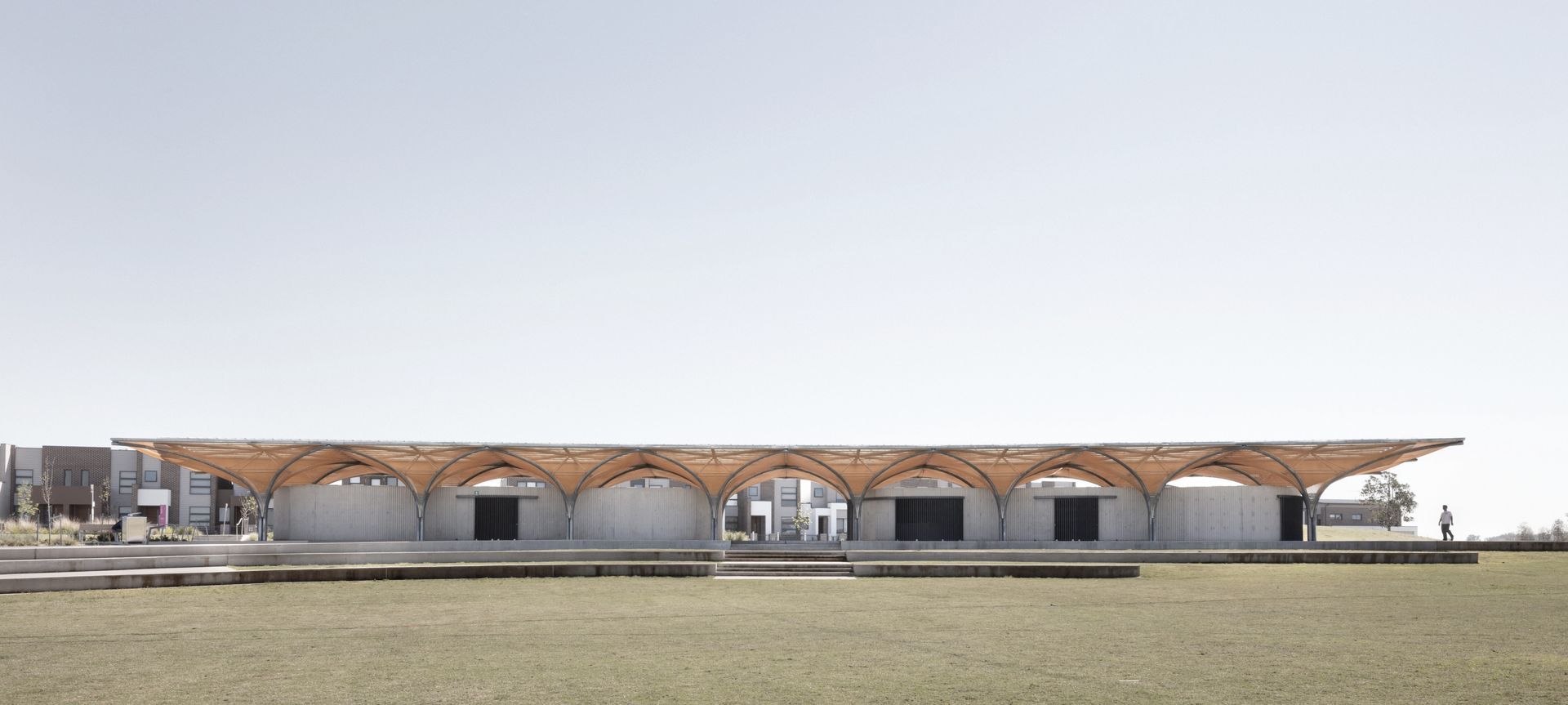 Golden Mesh Shades a Sports Pavilion in Sydney | ArchiPro AU