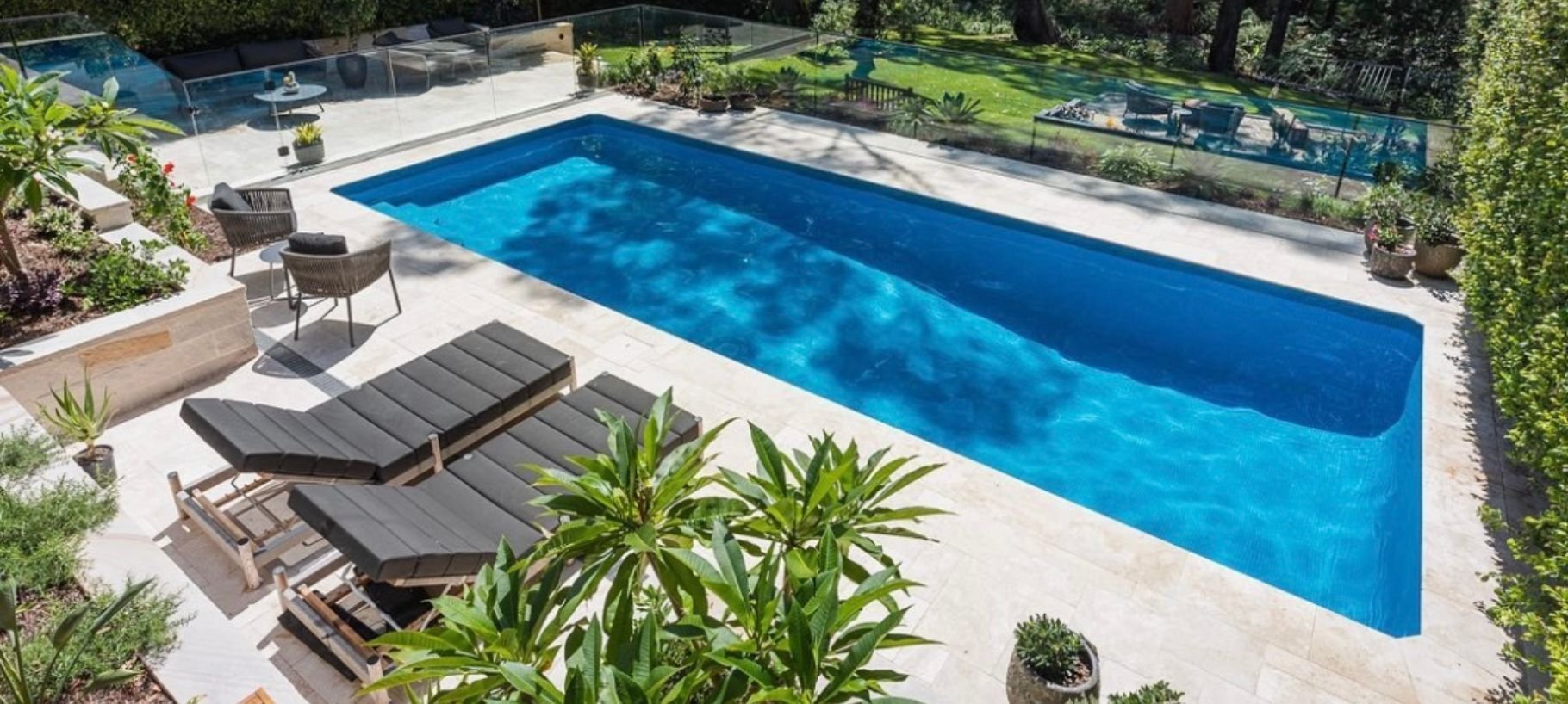 Choosing the Perfect Natural Stone Finish for Your Poolside Oasis