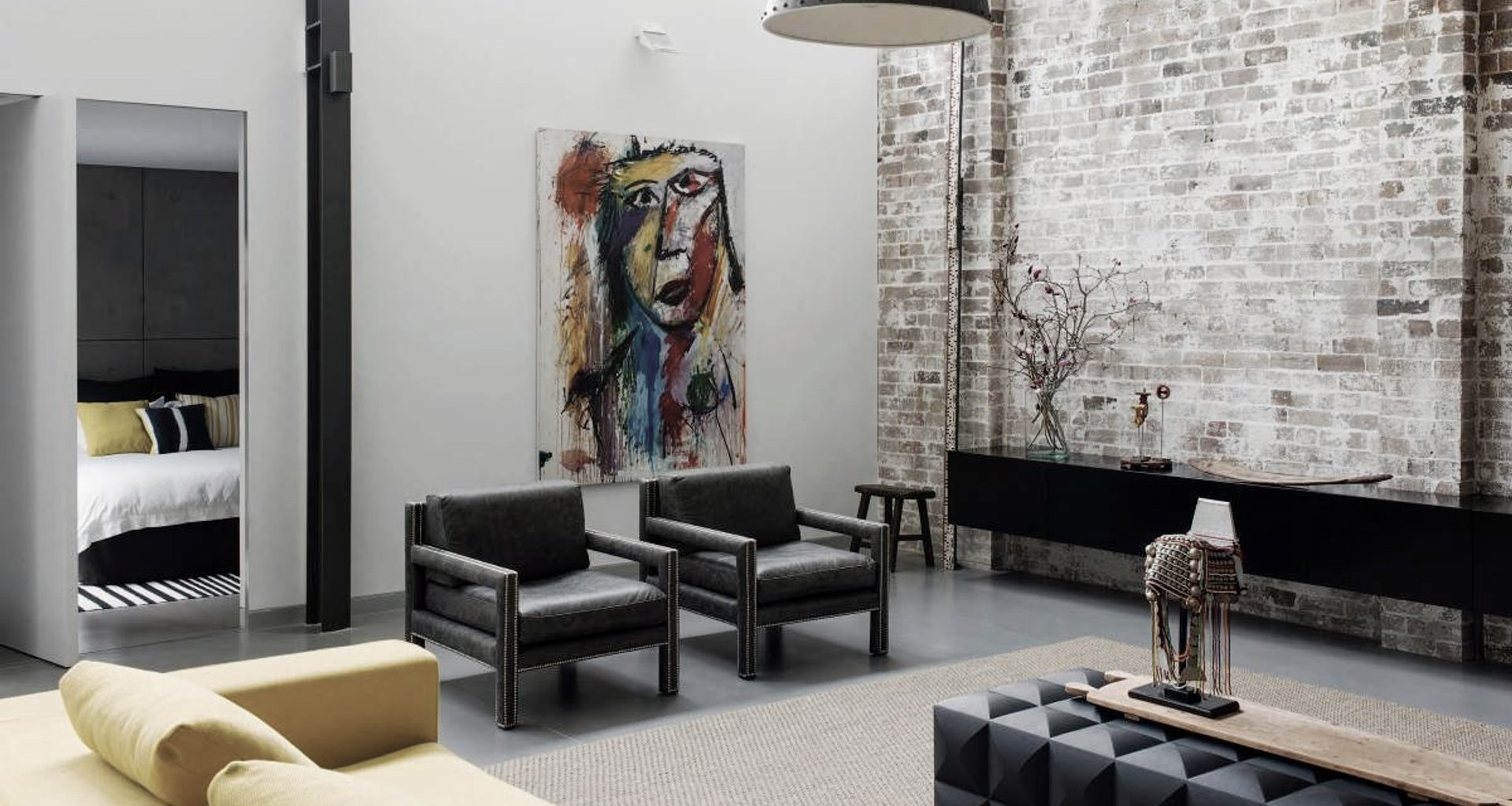 Raw materials and a refined palette transformed an industrial warehouse ...