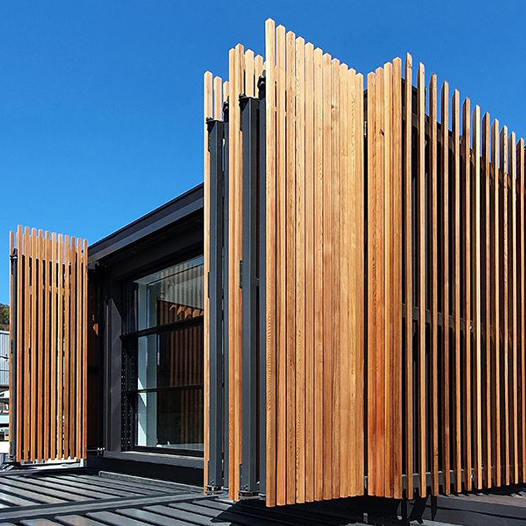 Motorised Vertical Bi-Fold Screens | Shade Factor | ArchiPro AU