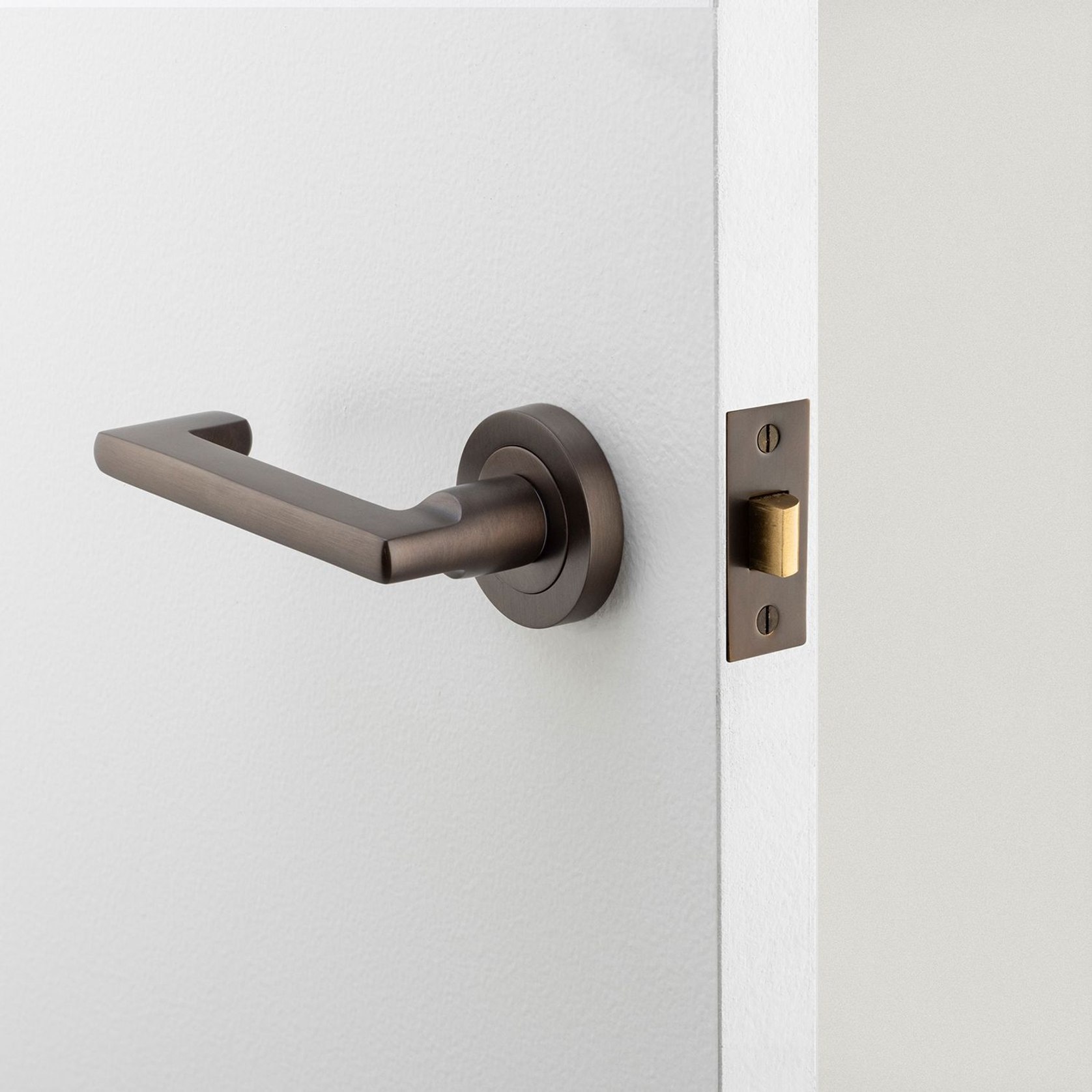 Iver Baltimore Return Door Lever Handle on Round Rose | ArchiPro AU