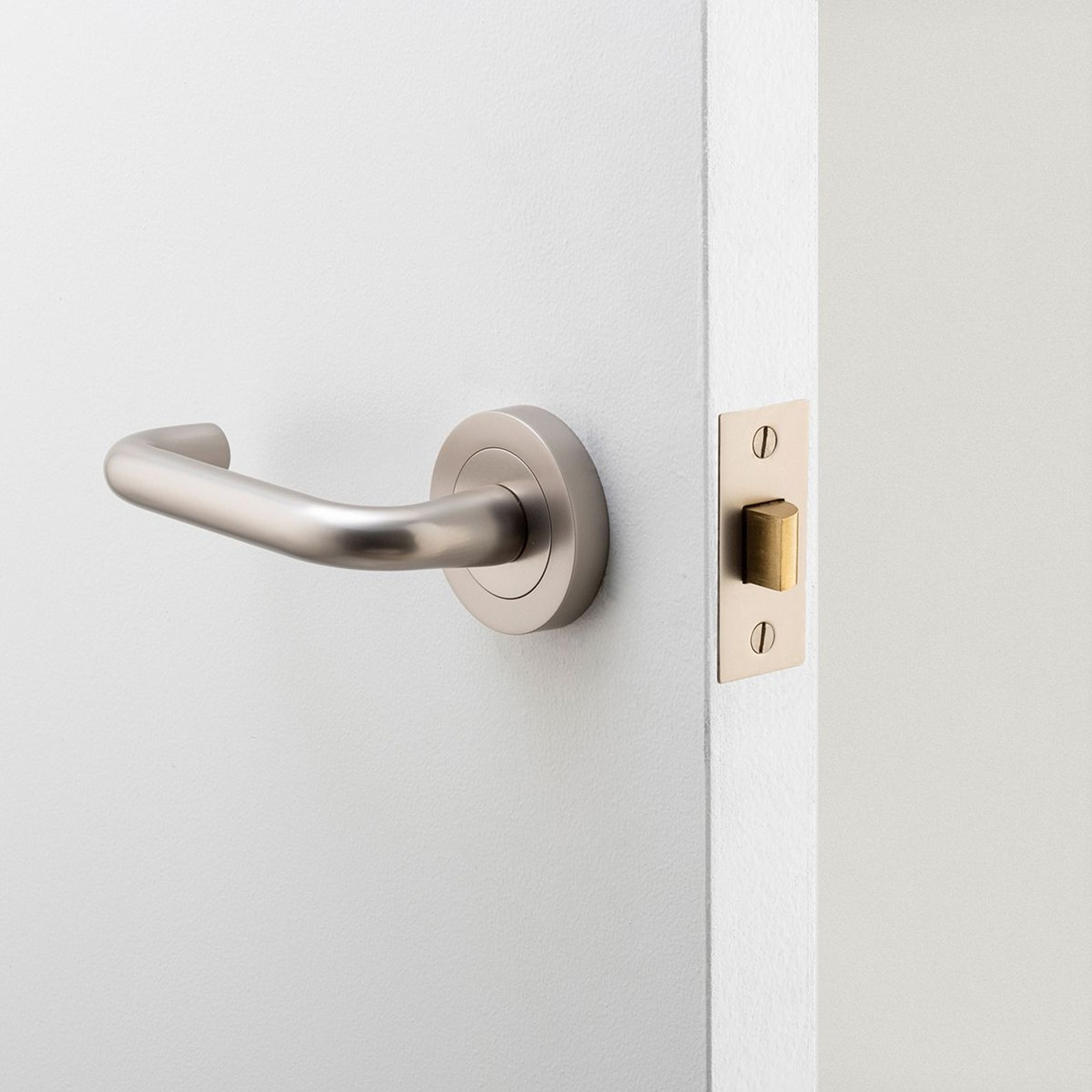 Iver Oslo Door Lever Handle On Round Rose Passage | ArchiPro AU