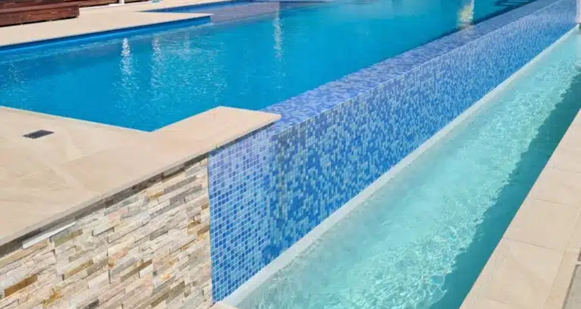Infinity Edge Pool and Concealed Pool Cover by Aussie Undercover | ArchiPro AU